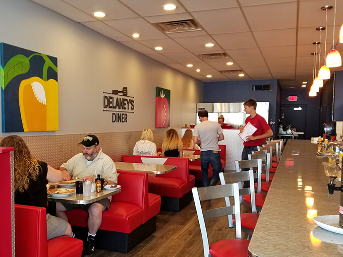 Red vinyl booths – the unofficial thrones of diner royalty – invite you to settle in for a feast that justifies every calorie with pure satisfaction.
