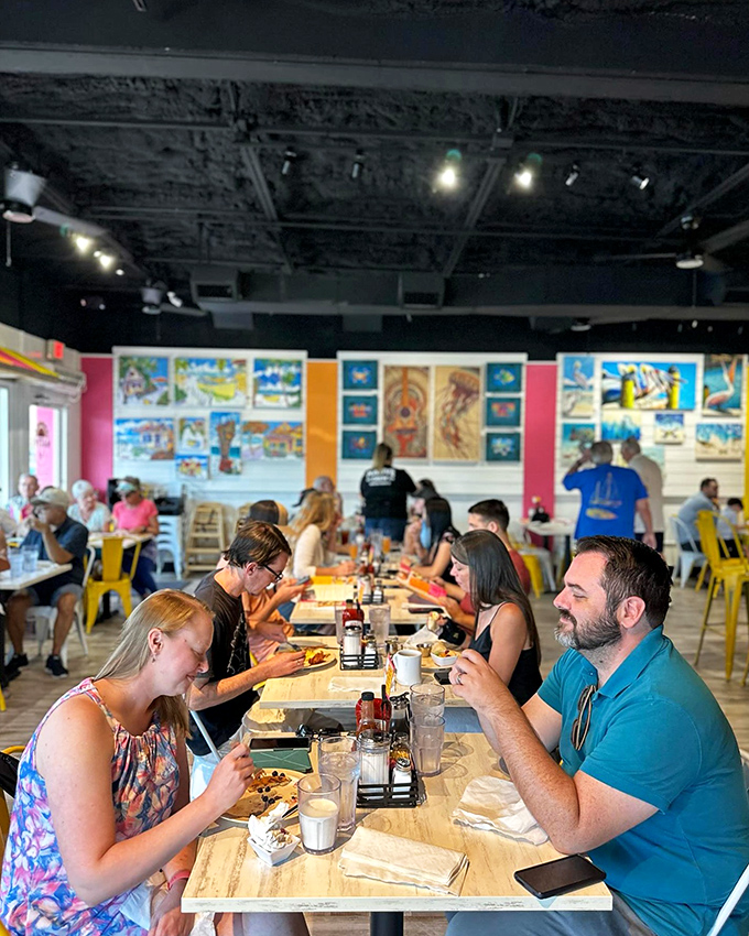 Real people enjoying real food without a phone in sight. It's like watching an endangered species in their natural habitat.