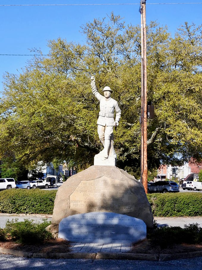 The Doughboy Monument stands at attention, a silent sentinel honoring those who served—some stories are etched in stone rather than told aloud.