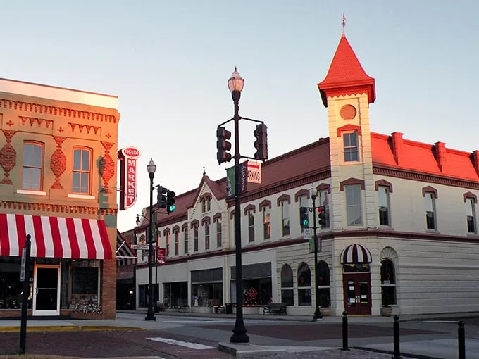 Downtown Newberry's sunset glow turns historic buildings into a watercolor painting. That red tower isn't compensating for anything—it's just that magnificent.