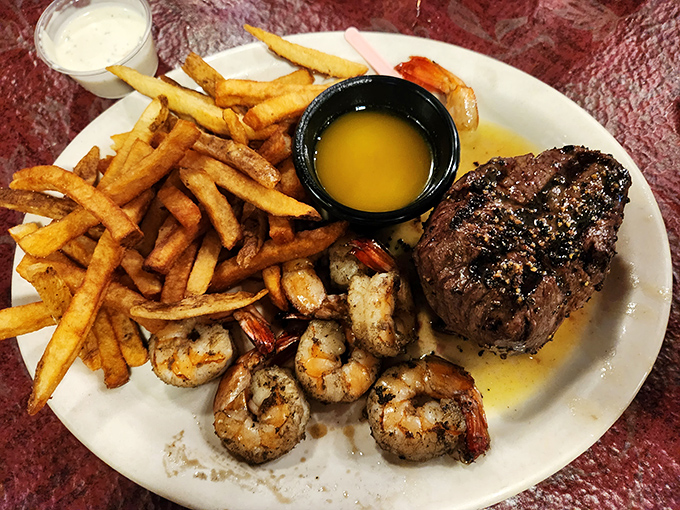 Surf meets turf in perfect harmony—this plate doesn't just represent dinner; it's the culinary equivalent of having your cake and eating it too.