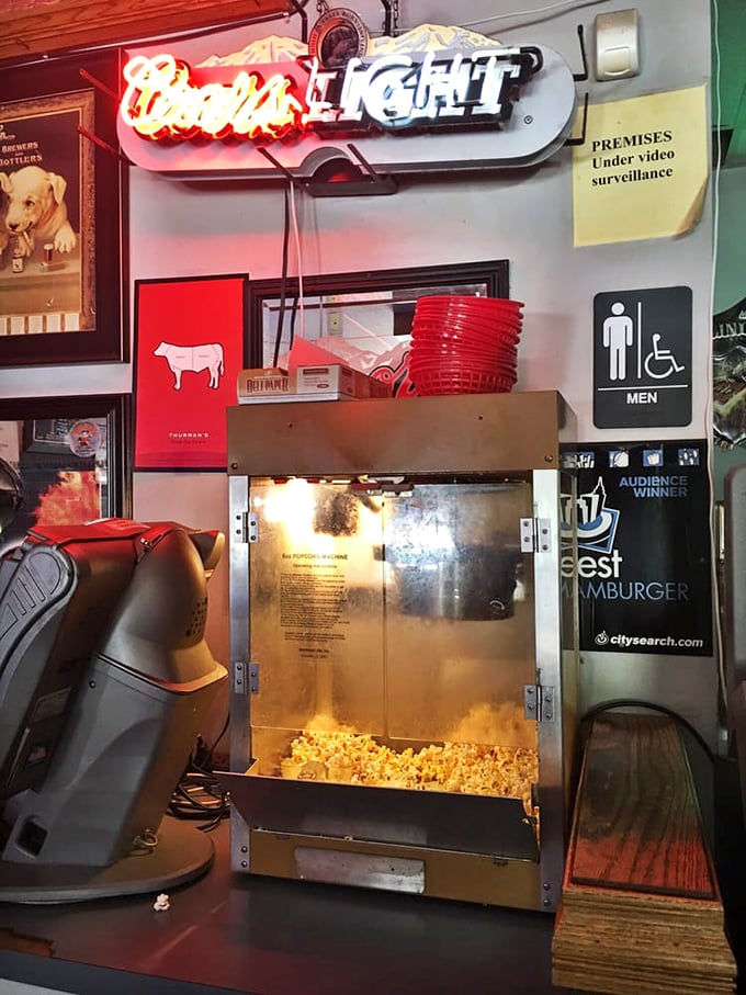 Free popcorn under the glow of neon – because sometimes you need an appetizer for your appetizer before tackling a Thurmanator.