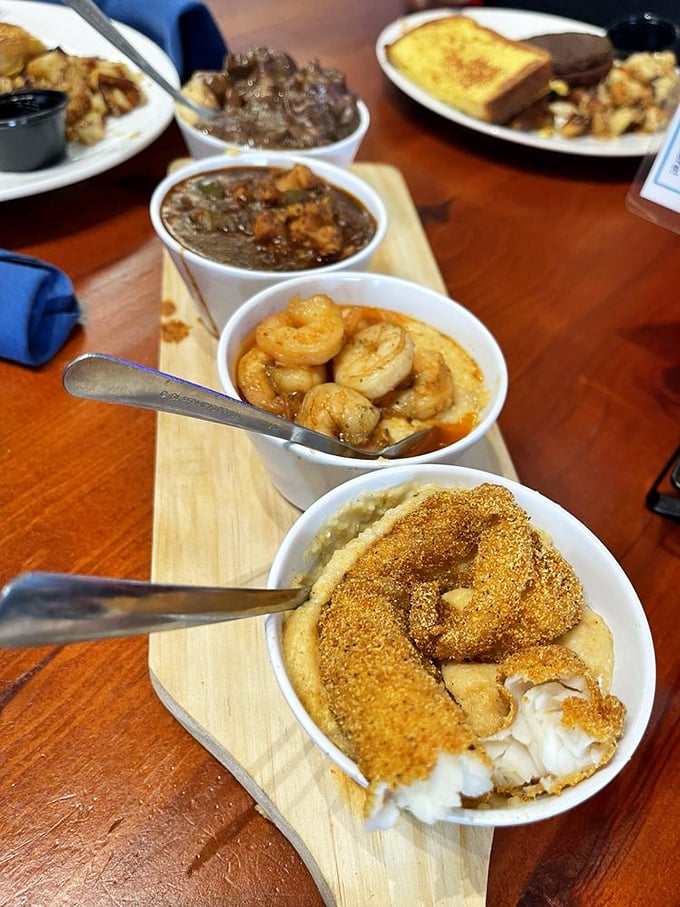 A wooden board of Southern sides—where grits become a canvas for flavors from savory to sweet.