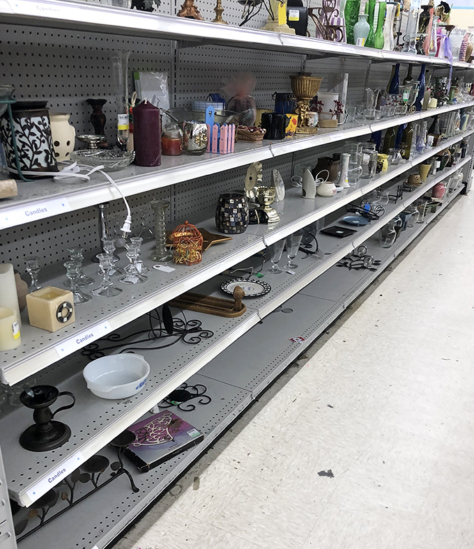 Candle holders, vases, and decorative trinkets line these shelves like an affordable interior design buffet waiting to be sampled.