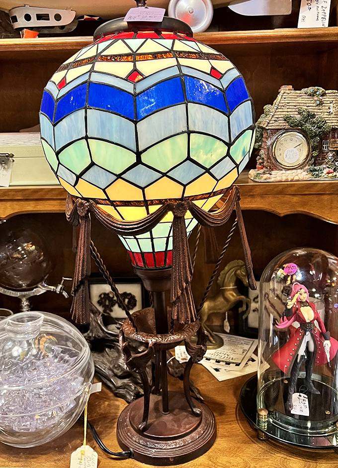 Up, up, and away! This stained glass hot air balloon lamp transforms any room into a whimsical dreamscape of color and imagination.