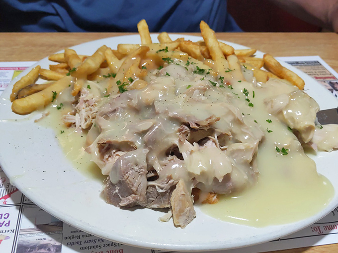 Hot turkey smothered in gravy that cascades over the meat like a savory waterfall. The fries aren't just a side—they're gravy delivery vehicles.