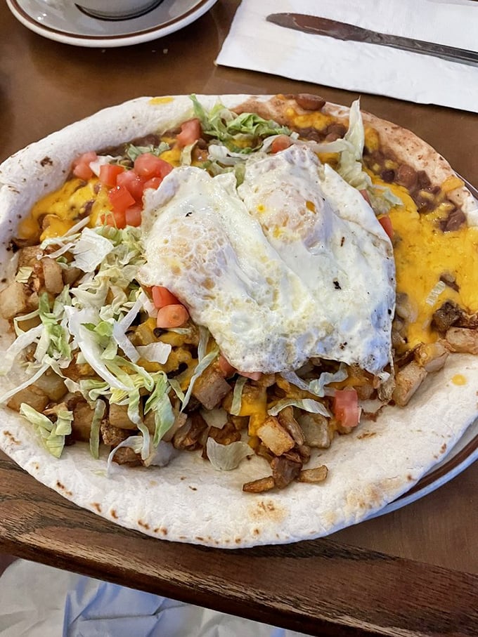Breakfast of champions: eggs perched majestically atop a foundation of flavors that would make any morning worth getting up for.