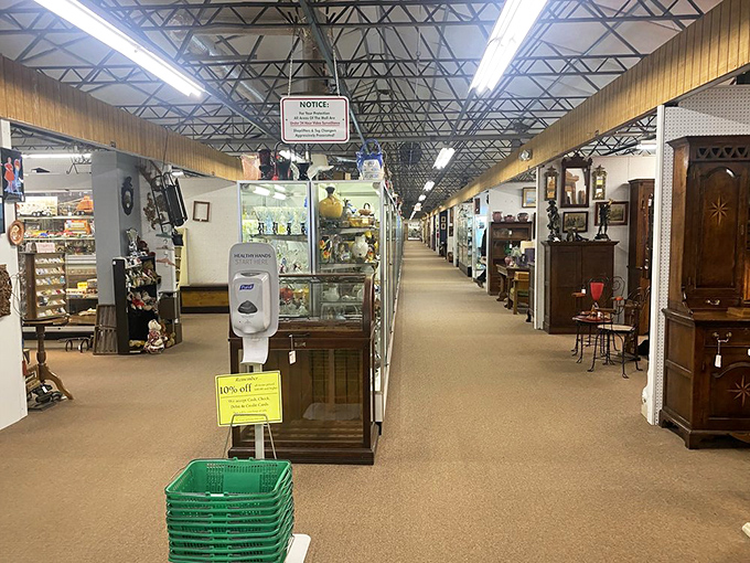The antique hunter's natural habitat—wide aisles, good lighting, and endless possibilities. That hand sanitizer station is the only modern concession.
