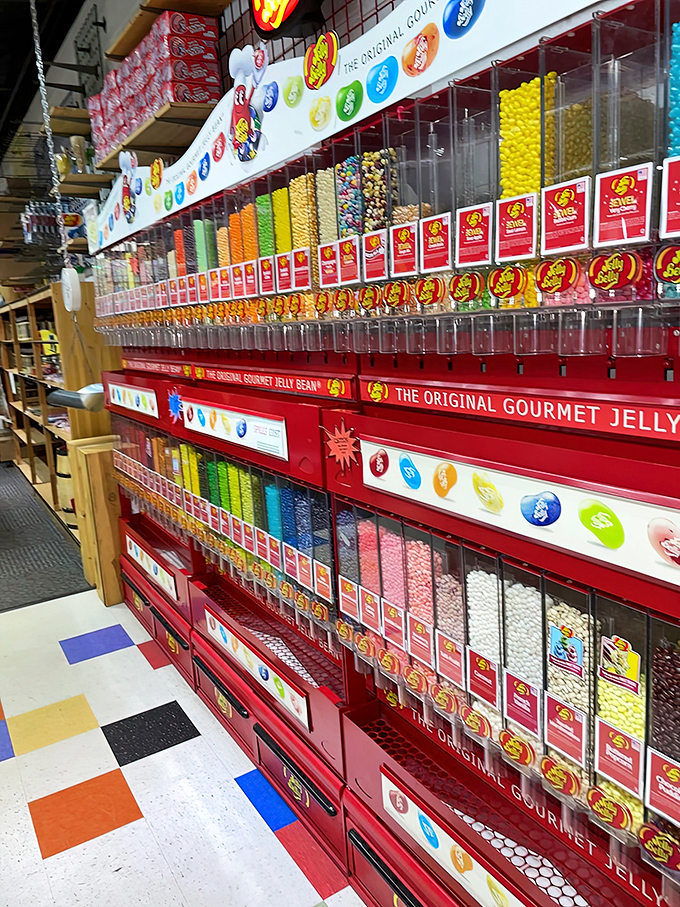 The Jelly Belly wall – a masterpiece of engineering where flavor selection becomes an art form and bean-by-bean customization is encouraged.