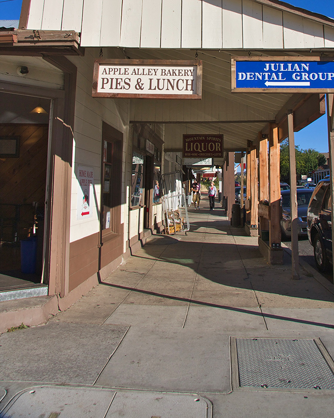 Julian's covered walkways invite leisurely exploration of shops offering everything from apple pie to local crafts – no rushing allowed here.