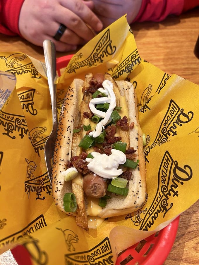 A loaded potato dog that combines two comfort food favorites in one handheld package – the culinary equivalent of a warm hug.