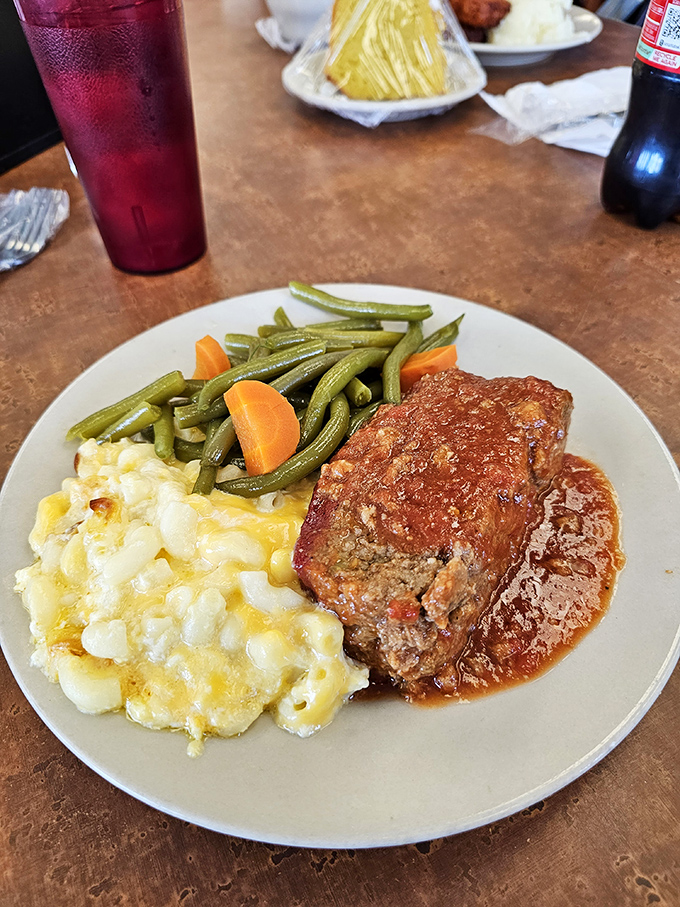 Meatloaf, mac and cheese, and green beans—the holy trinity of home cooking that tastes even better when someone else makes it.