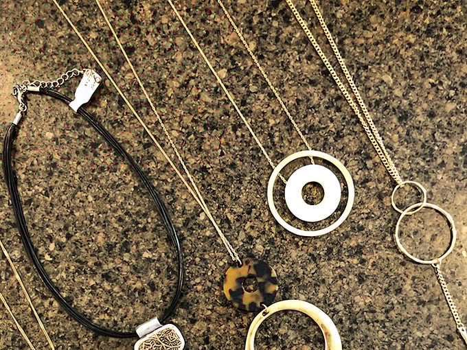 Jewelry that tells stories—each pendant and chain waiting for the right neck to continue its journey through style history.