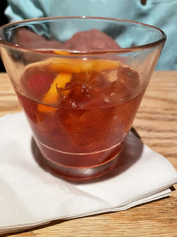 An Old Fashioned that Don Draper would approve of – amber liquid, aromatic bitters, and just enough sweetness to balance the bourbon.
