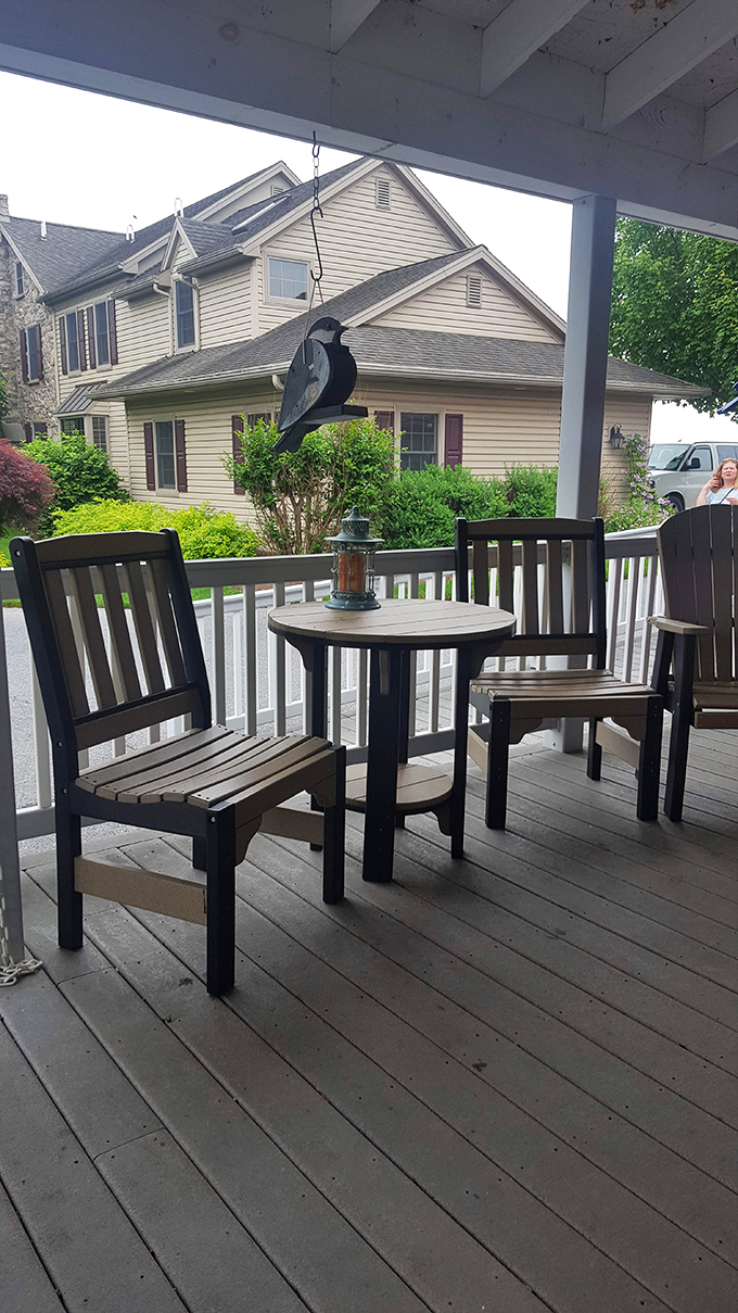The porch isn't just a waiting area—it's where you catch your breath between bites. These chairs have witnessed countless sugar-induced epiphanies.