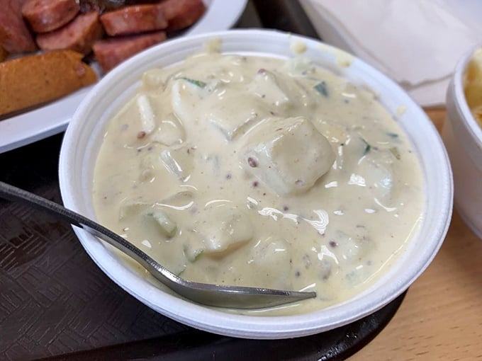 Potato salad that knows its role – cooling the palate between bites of smoky meat while bringing its own creamy, tangy personality to the party.