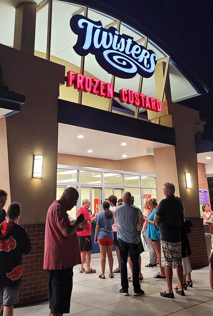 The nighttime pilgrimage to Twisters—where Kansas locals gather under illuminated signage, united in their quest for creamy perfection.