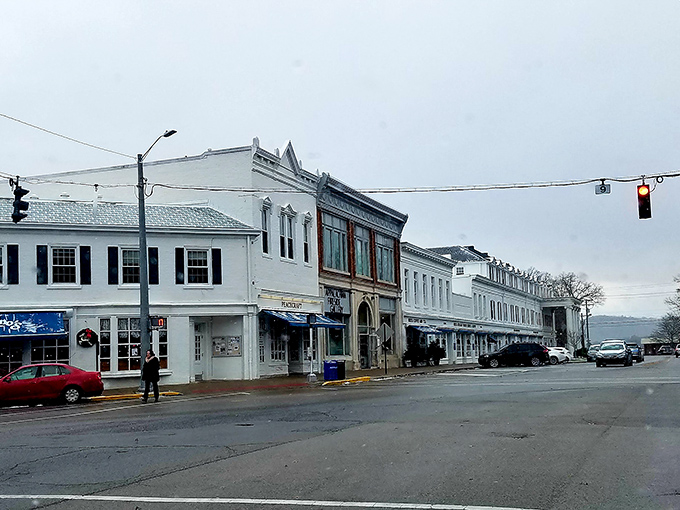 Winter's muted palette softens Berea's historic streetscape, where white buildings stand like sentinels against a pearl-gray Kentucky sky.