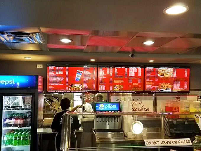 Where the magic happens. That illuminated menu board is like reading the classics—timeless options that never disappoint the hungry masses.