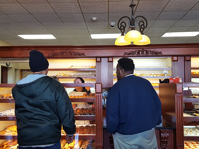 The counter exchange – that brief moment where money and pleasantries are traded for happiness wrapped in wax paper.
