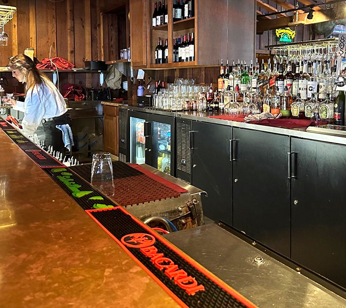 The bar at Cattlemens isn't trying to reinvent mixology—it's perfecting the classics that pair perfectly with a carnivorous feast.