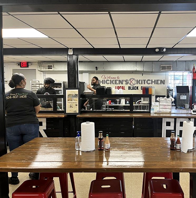 The kitchen staff works their magic behind glass, like culinary performers whose daily show always ends with a standing ovation.