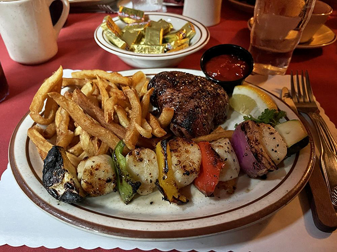 Surf and turf done right – where perfectly grilled steak meets fresh scallops in carnivorous harmony. 