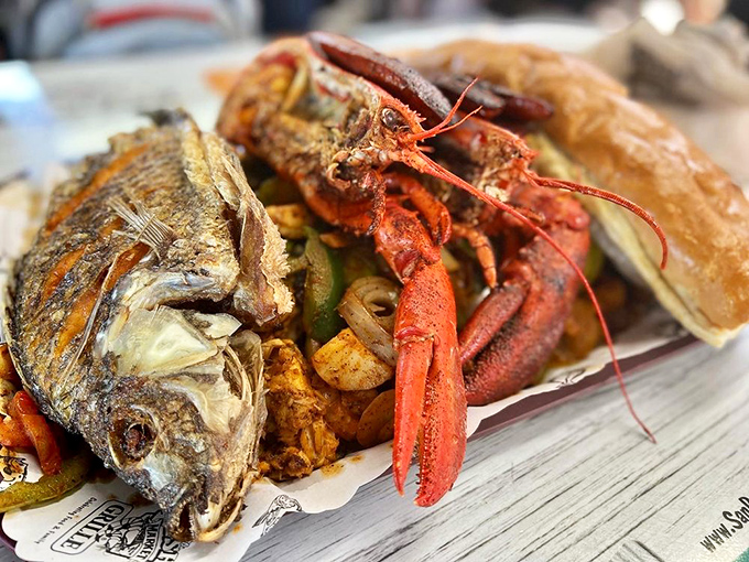 The seafood equivalent of a royal feast – whole fish and lobster holding court over a bed of potatoes and vegetables fit for Neptune himself.
