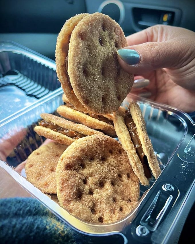 These golden discs aren't just cookies—they're buttery time machines transporting you back to childhood with each cinnamon-sugar bite.