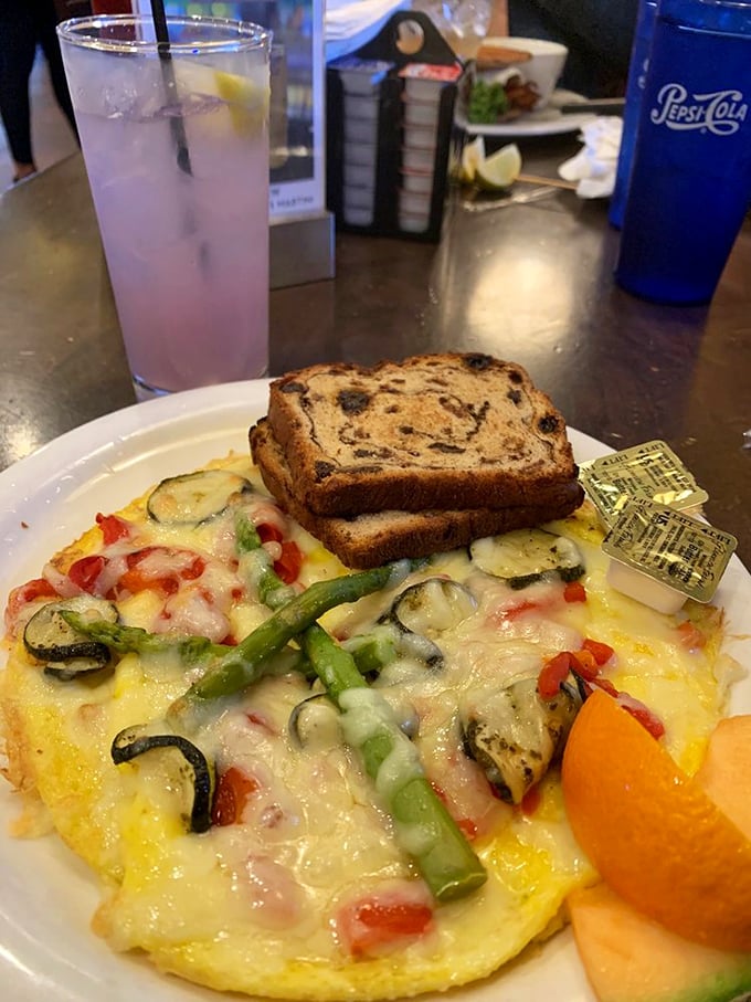 Veggie frittata that proves vegetarian options aren't just afterthoughts here—this is a star of the breakfast show.