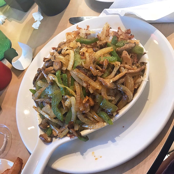A skillet loaded with enough vegetables and savory goodness to make you temporarily forget about that tenderloin sandwich. Almost.