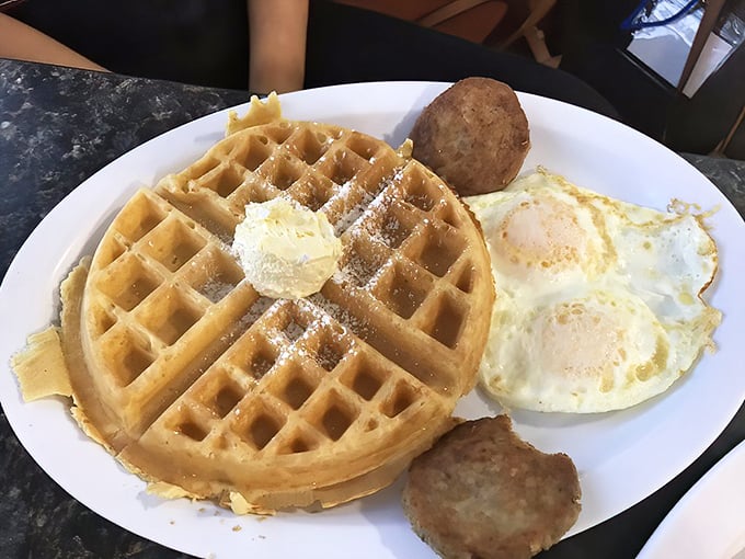 This waffle doesn't need to be photographed for social media—it's too busy fulfilling its destiny as breakfast perfection.