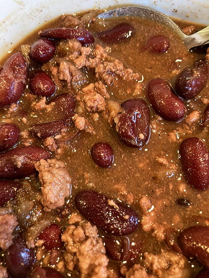 This isn't just chili – it's a spicy, bean-studded hug in a bowl, offering warmth that reaches beyond temperature into something resembling contentment.