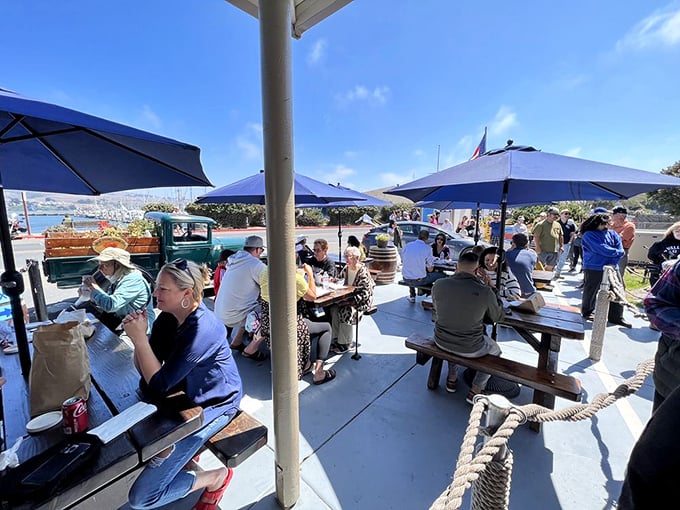 The outdoor dining scene—where strangers become friends over shared chowder enthusiasm. Ocean views included at no extra charge.