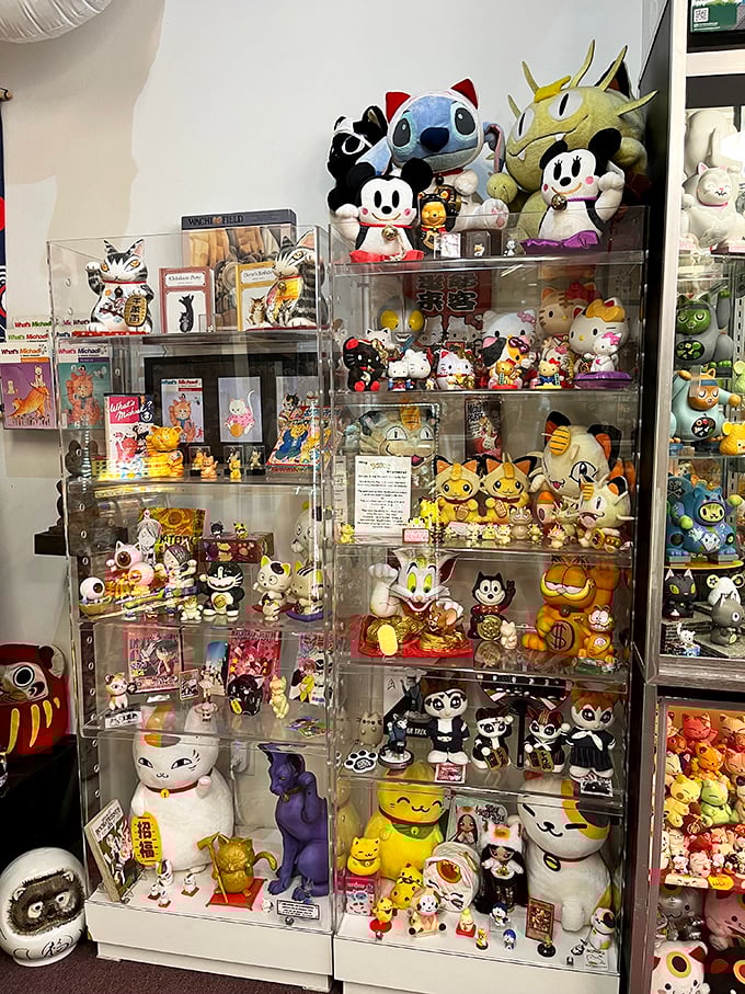 Pop culture meets tradition in this display featuring familiar cartoon characters reimagined as lucky cats – Mickey Mouse has never looked so fortunate!