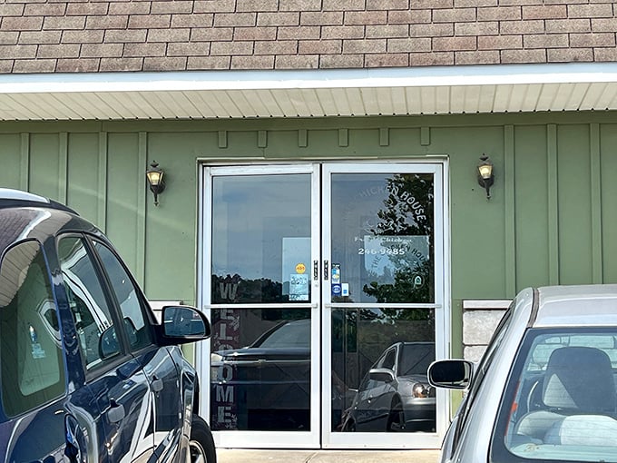 The entrance may be simple, but it's a portal to one of Indiana's most beloved chicken institutions—no red carpet needed.