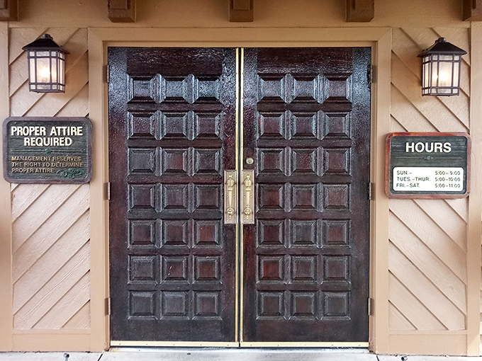 "Proper Attire Required"—three words that tell you everything about the experience that awaits behind these doors. Some traditions are worth keeping.