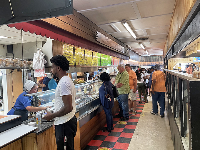 Customers line up for authentic deli treats—proof that some of life's greatest pleasures still can't be delivered by app or acquired through drive-thru windows.