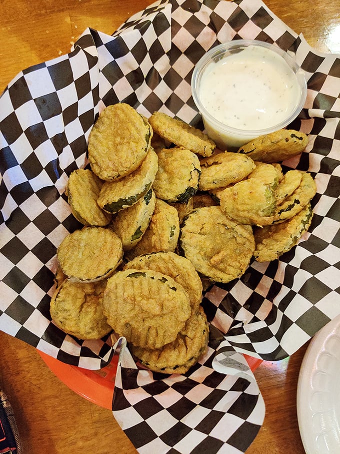 Fried pickles with ranch—the appetizer that converts skeptics into evangelists. One basket is never enough for the table, no matter how many people are sharing.