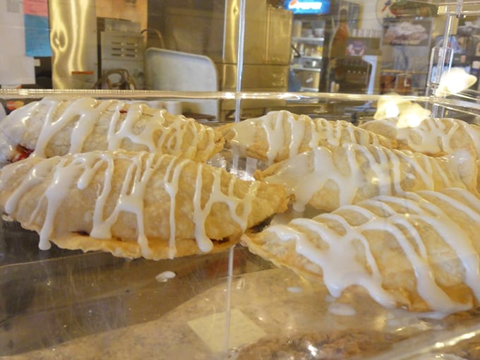 Hand pies drizzled with sweet glaze – portable perfection for those who understand that pie shouldn't be limited to sit-down occasions.