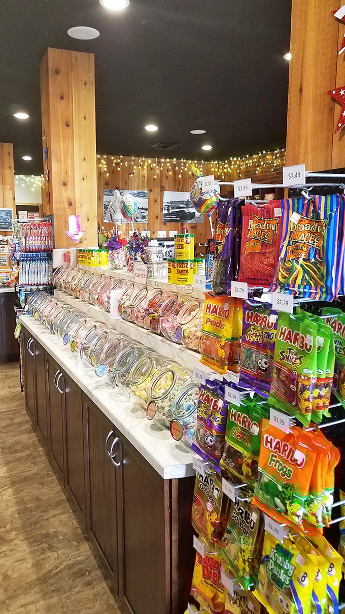 Haribo packages hang like colorful ornaments beside jars of penny candy that cost considerably more than a penny.