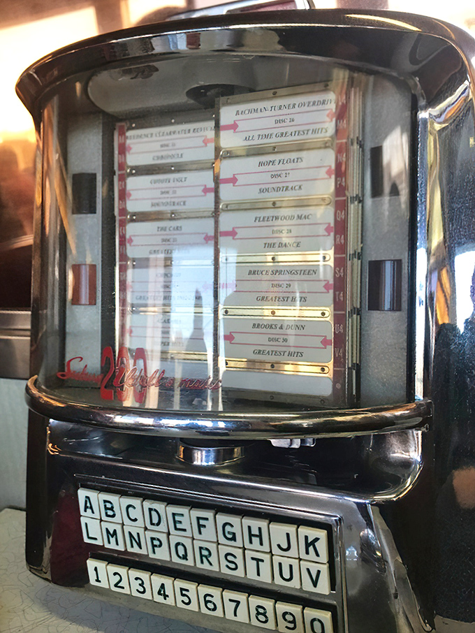 The jukebox—loaded with classics from Springsteen to Fleetwood Mac—because good food deserves a proper soundtrack from an era when music made sense.