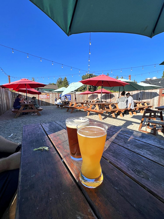Cold beer and sunshine—the perfect companions to barbecue. This patio is where afternoon plans go to die, in the best possible way.