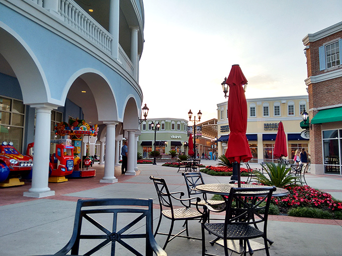Elegant outdoor seating areas provide retail refugees with a moment of respite, where shoppers can contemplate their next strategic move.
