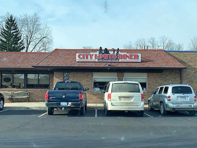 The parking lot on a busy morning—where hungry patrons gather like pilgrims at a breakfast shrine. Worth every minute of the wait.