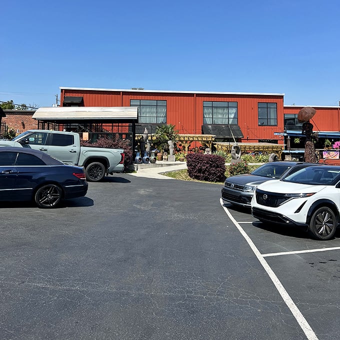 Even the parking lot hints at the treasures within—the red building standing like a culinary lighthouse guiding hungry travelers to flavorful shores.
