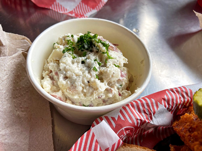 Potato salad that doesn't come from a plastic tub at the supermarket. This is the real deal—chunky, fresh, and made with actual human hands.