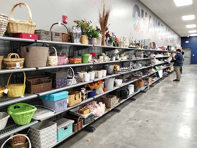 Baskets and containers of every shape and purpose line these industrial shelves. Organization never looked so affordable or eclectic.