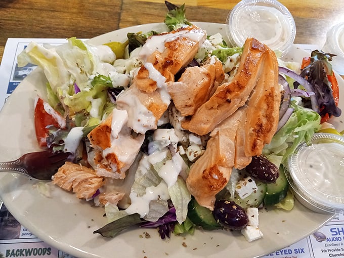 A grilled chicken salad that defies the sad desk lunch stereotype—generous, colorful, and proof that "eating light" doesn't mean leaving hungry.