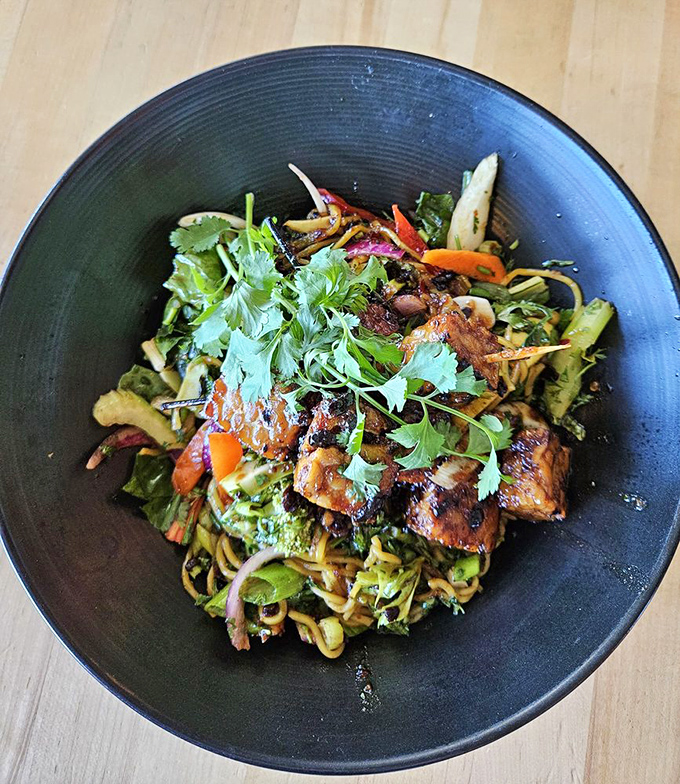 This isn't just a salad—it's a celebration of what happens when seafood meets fresh vegetables. A colorful carnival in a bowl.